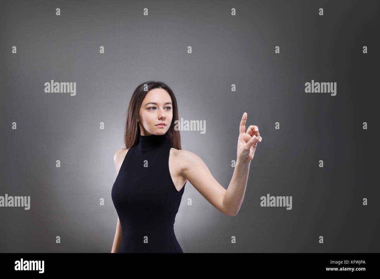 Young woman touching the empty screen Stock Photo - Alamy Young woman touching the empty screen Stock Photo - Alamy