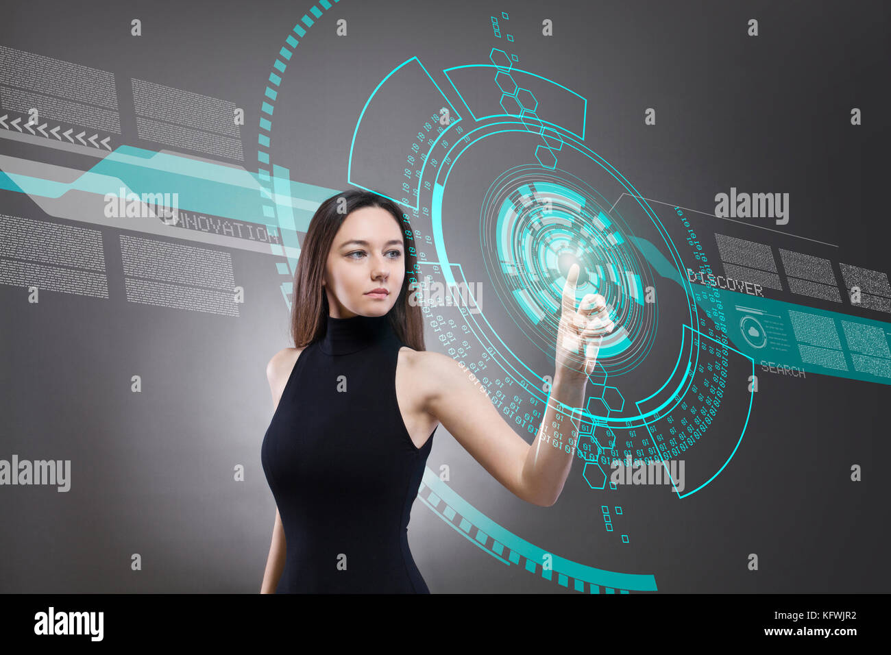 Young woman touching the virtual future interface Stock Photo - Alamy