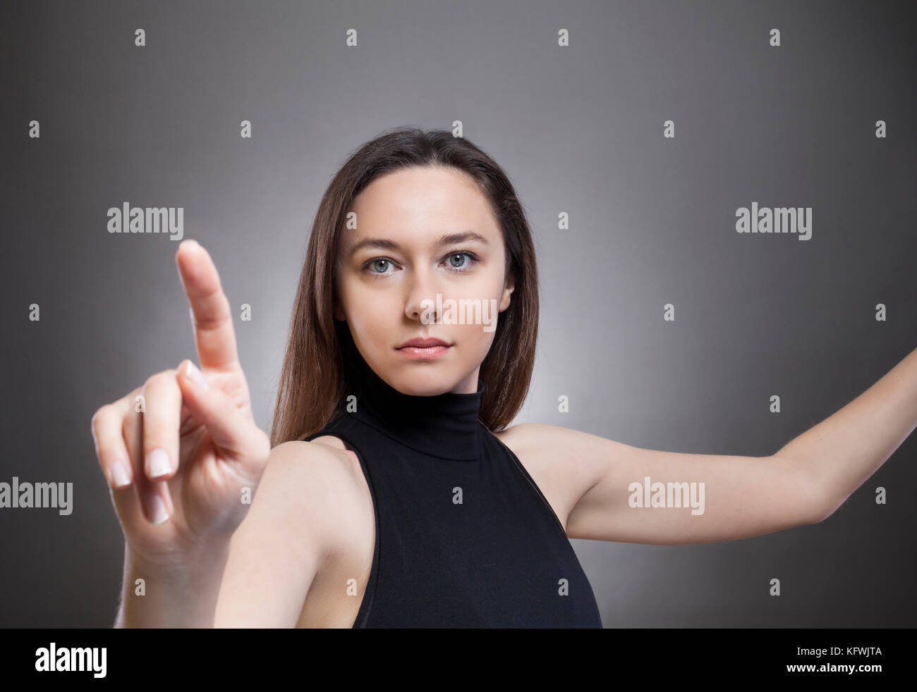 Young woman touching the empty screen Stock Photo - Alamy Young woman touching the empty screen Stock Photo - Alamy