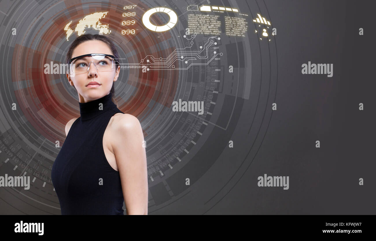 Beautiful woman with futuristic smart glasses Stock Photo - Alamy