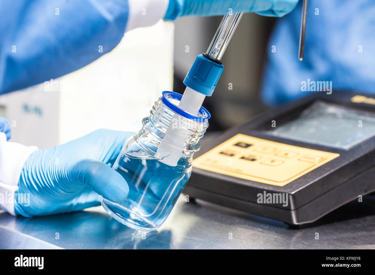 Scientist using a ph meter at laboratory Stock Photo - Alamy