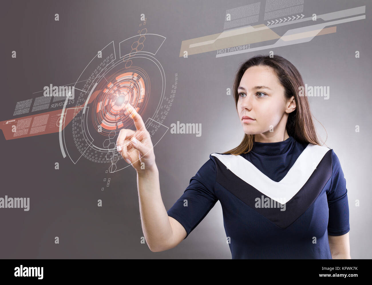Young woman touching the virtual future interface Stock Photo - Alamy