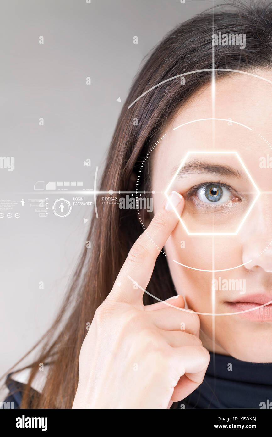 Woman pointing to eye Stock Photo - Alamy