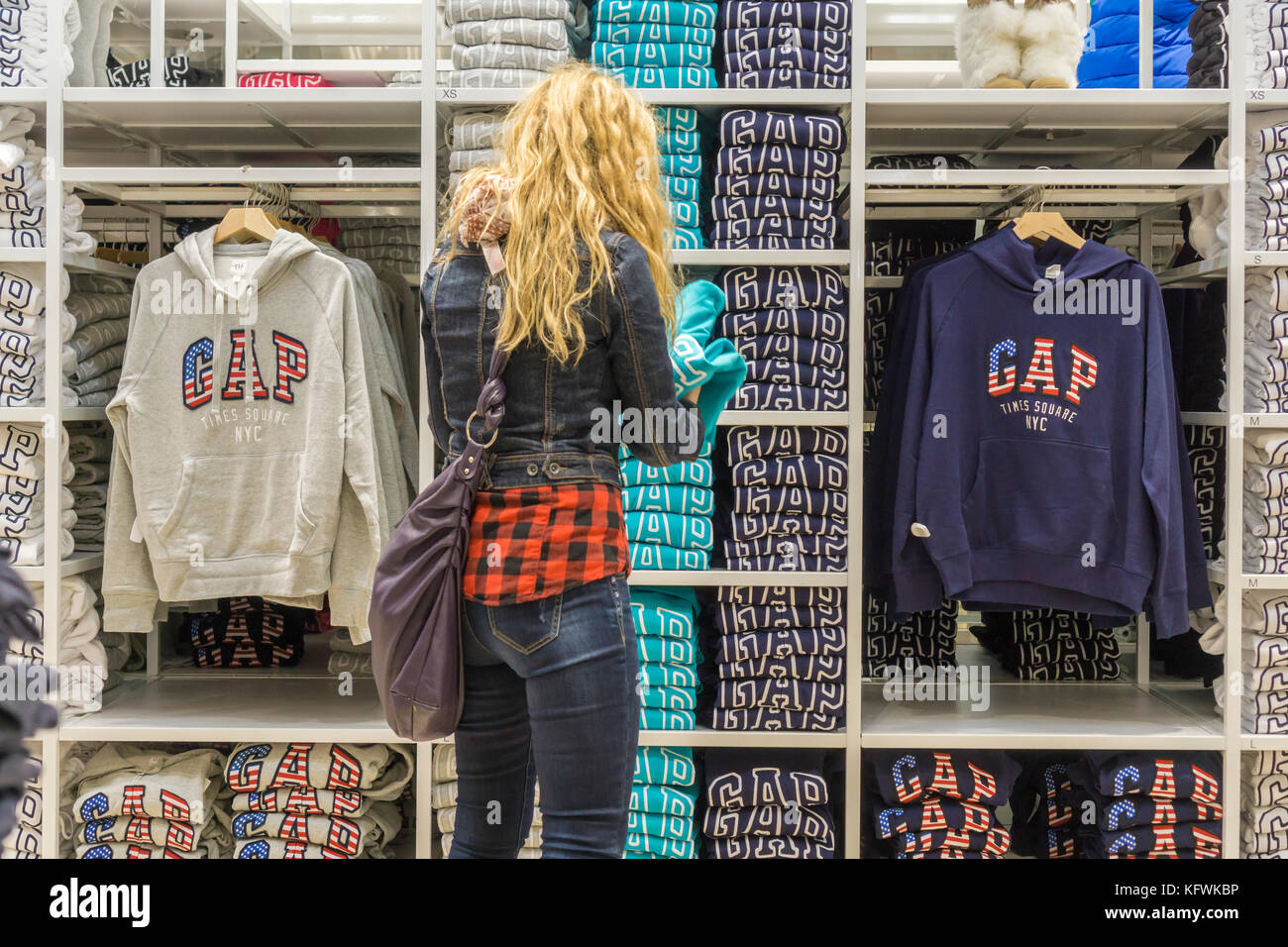 Customers shop in the brand new Gap "global brand flagship store" in ...