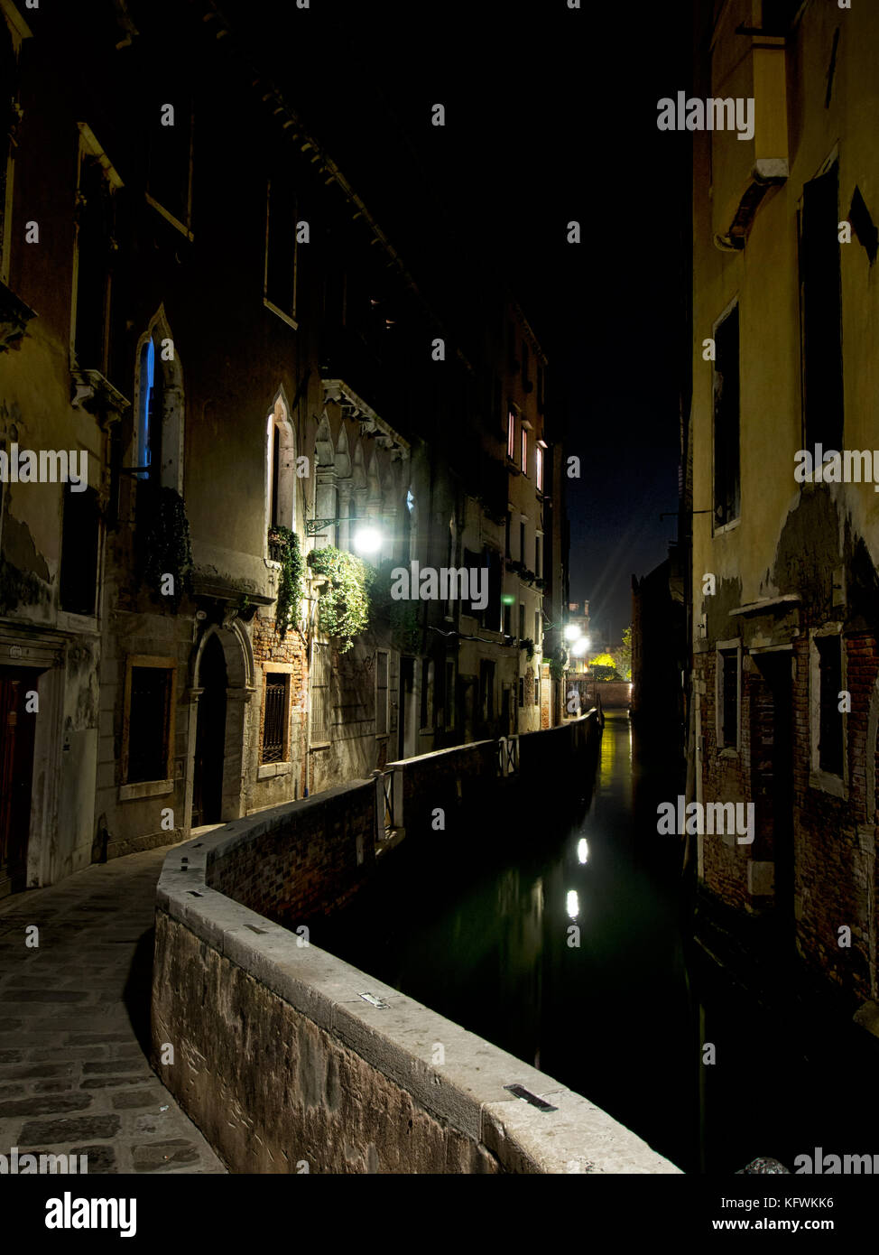 Backwater canal, Venice, Italy, by night Stock Photo - Alamy