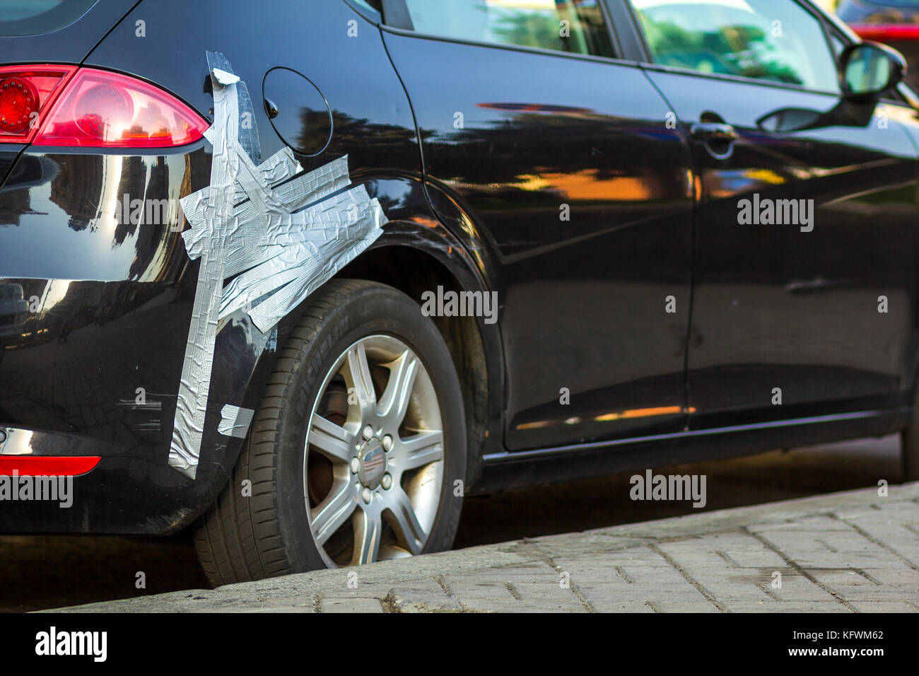 Kiev, Ukraine - September 20, 2017: Damaged car with duct tape repair ...