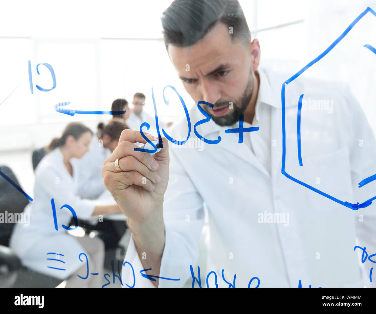 close up of a Man scientist working with formulas Stock Photo - Alamy