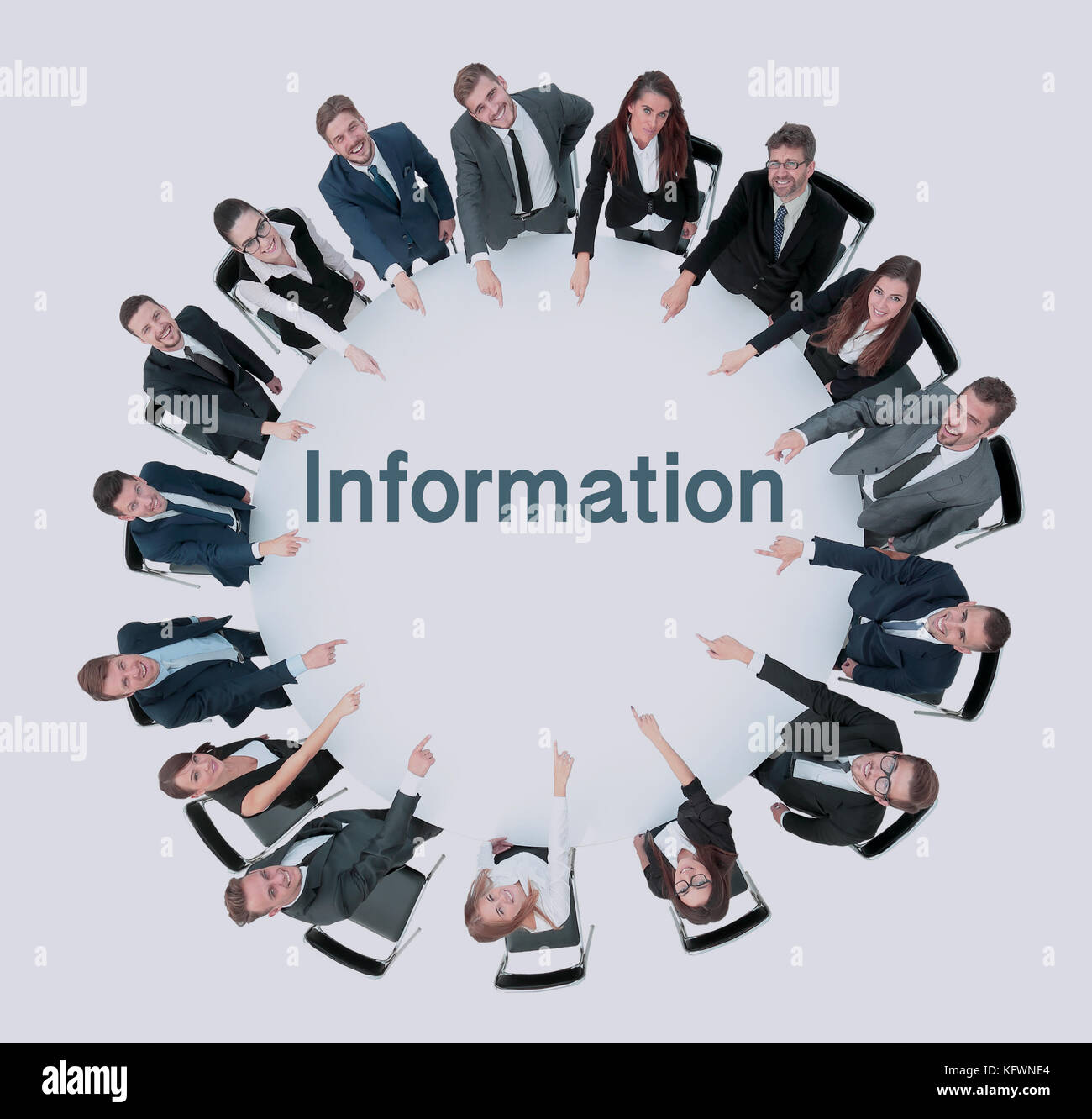 Happy business team pointing at something Stock Photo - Alamy