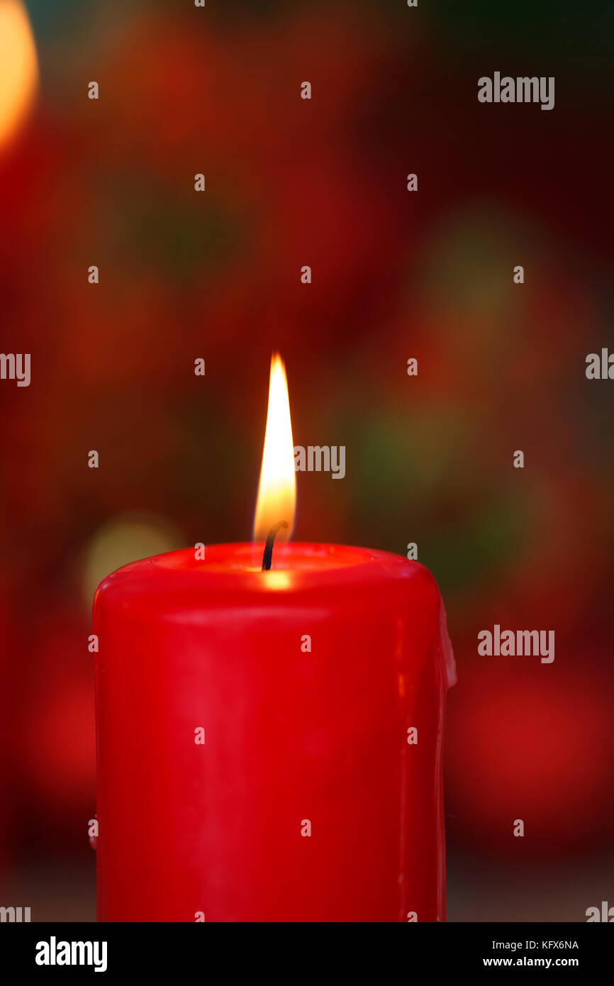 Christmas candle in red. Decoration for holidays Stock Photo - Alamy