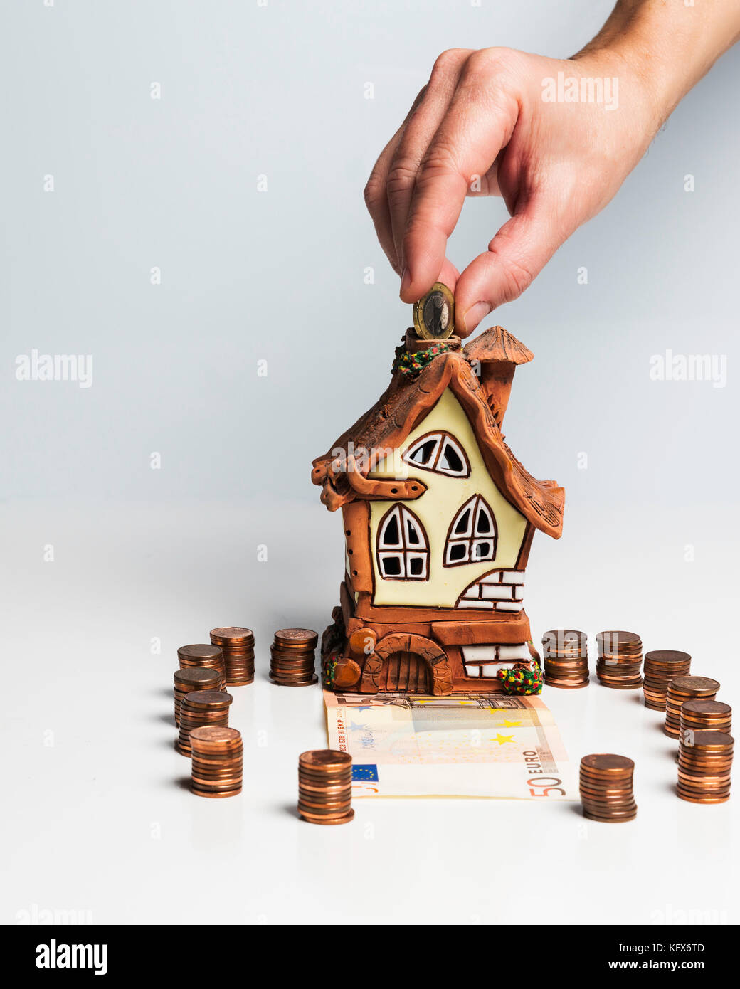 concept of saving for a real estate Investment Stock Photo - Alamy