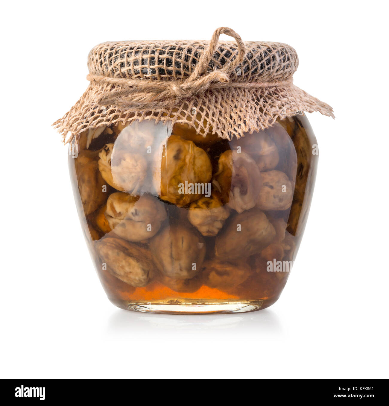 jam-jar of walnuts isolated on white background Stock Photo - Alamy