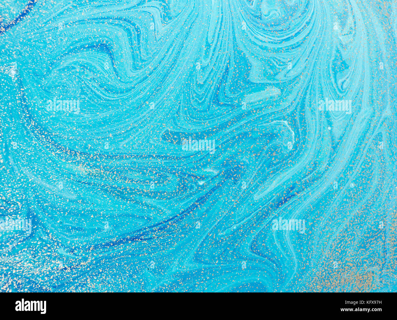 Marbled blue abstract background with golden sequins. Liquid marble ink ...