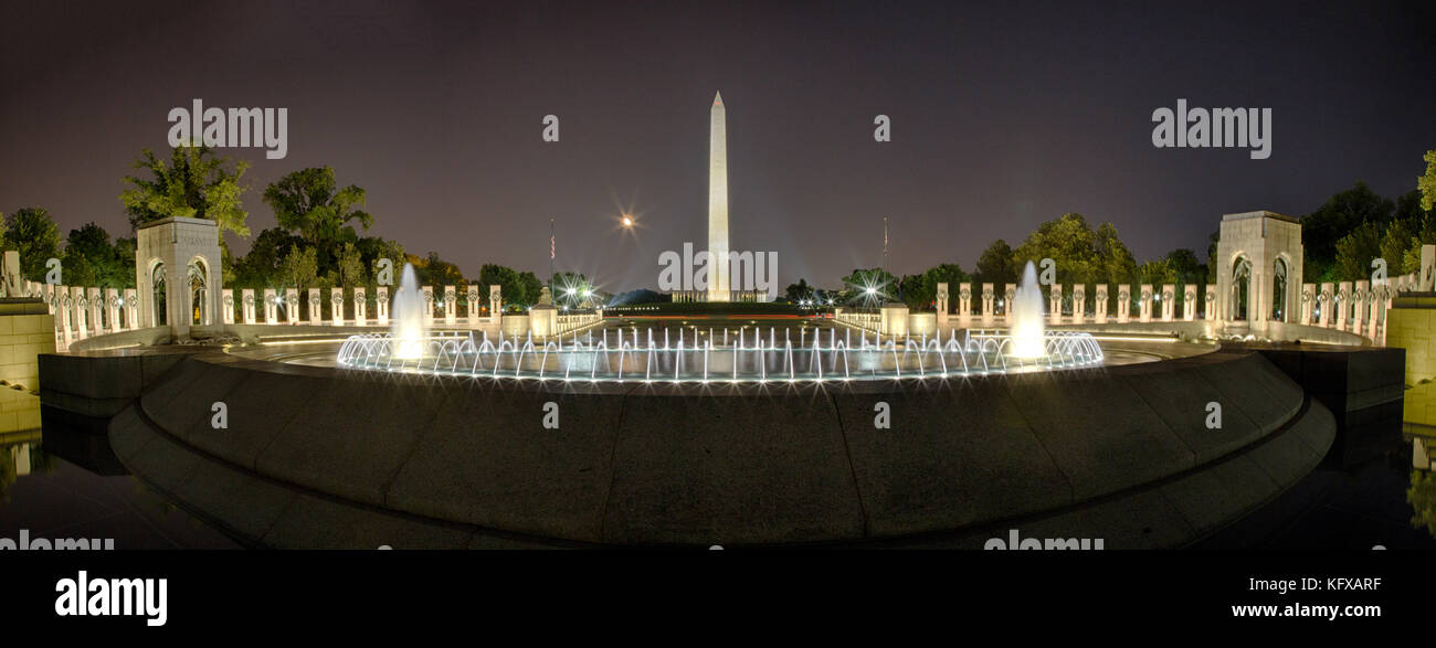 The moon rises over the World War Two memorial fountains and the ...