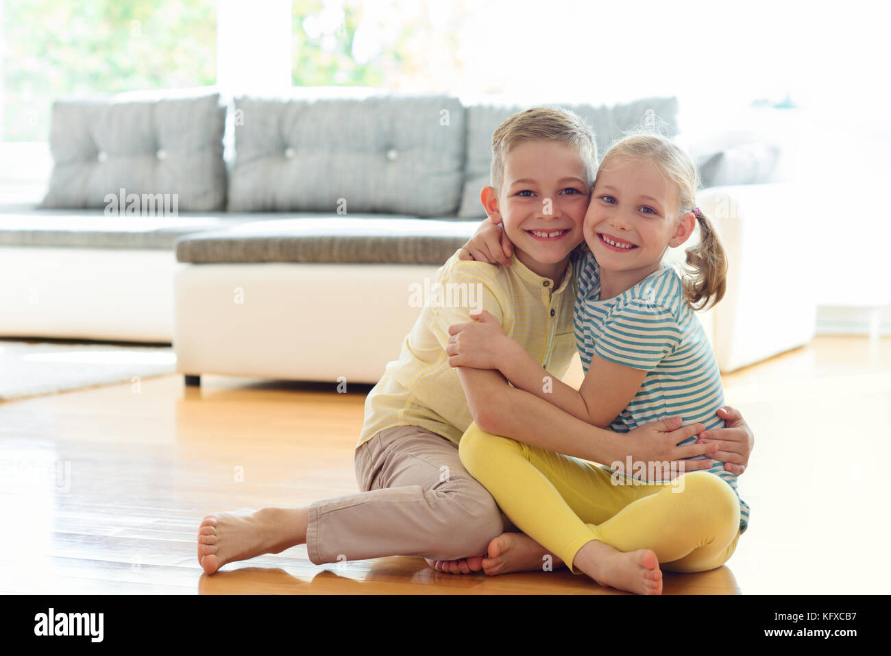 Cute little brother and sister having fun at home Stock Photo - Alamy