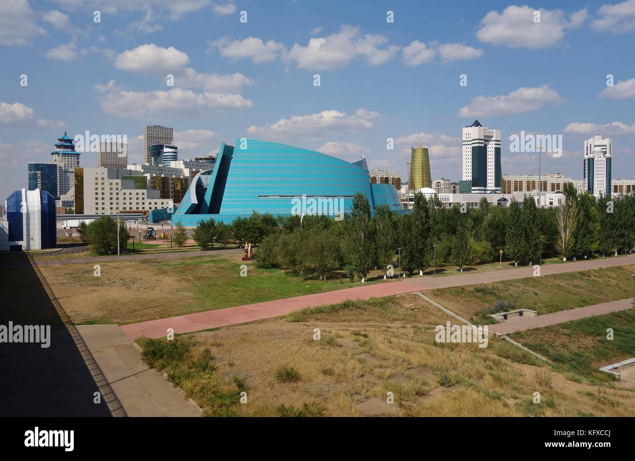 The Kazakhstan Central Concert Hall, a blue glass performing arts venue ...