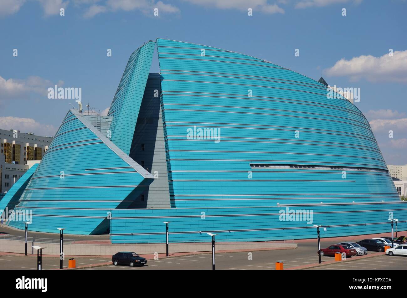 The Kazakhstan Central Concert Hall, a blue glass performing arts venue ...