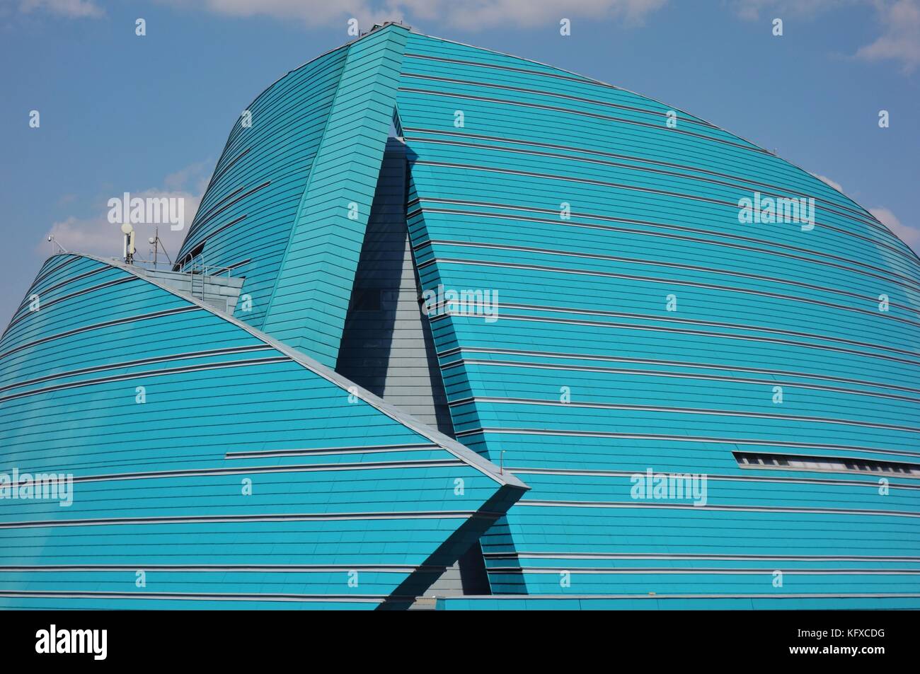 The Kazakhstan Central Concert Hall, a blue glass performing arts venue ...