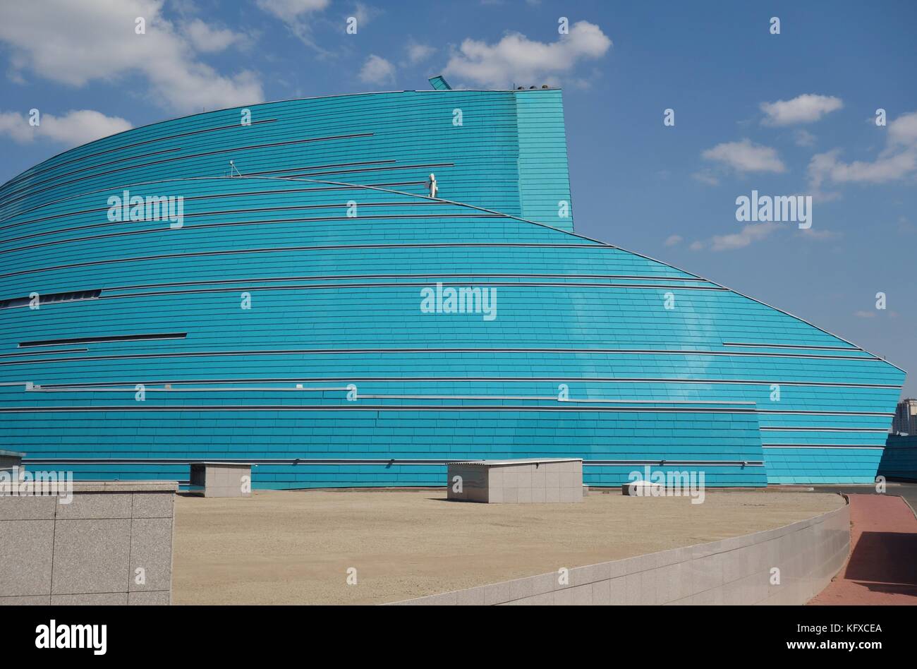 The Kazakhstan Central Concert Hall, a blue glass performing arts venue ...