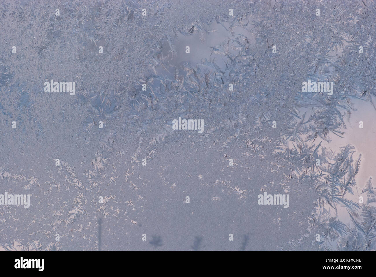 frosty patterns in the window Stock Photo - Alamy