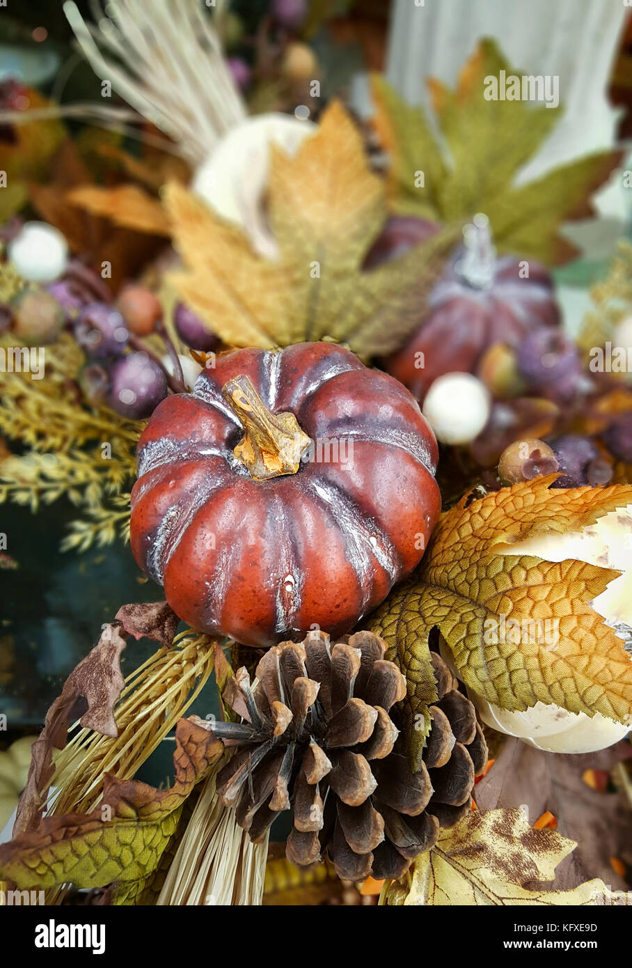 Autumn, fall decoration with a pumpkin, pine cone, leaves. Natural ...