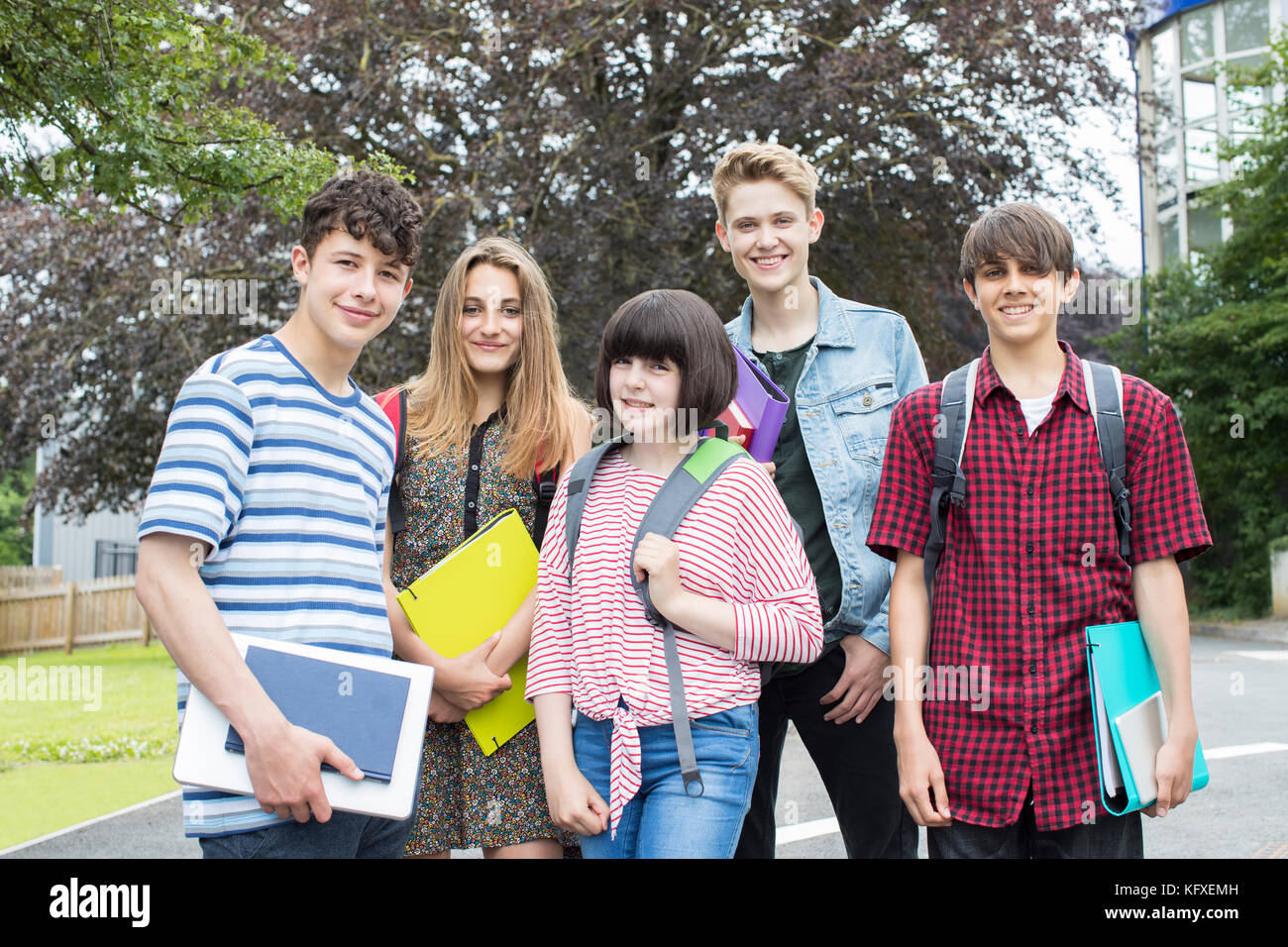 Portrait Of Teenage Students Outside School Building Stock Photo - Alamy