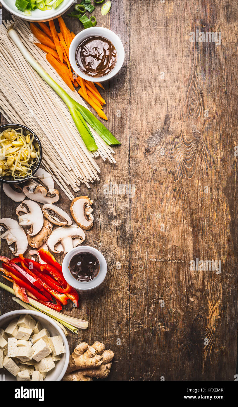 Various asian cuisine ingredients with tofu, noodles , spices ...