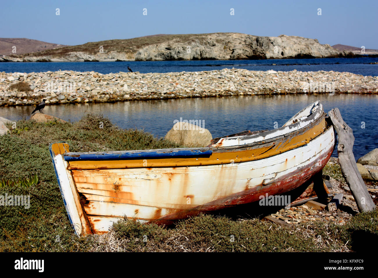 Boat on the beach on Delos, Cyclades Stock Photo - Alamy