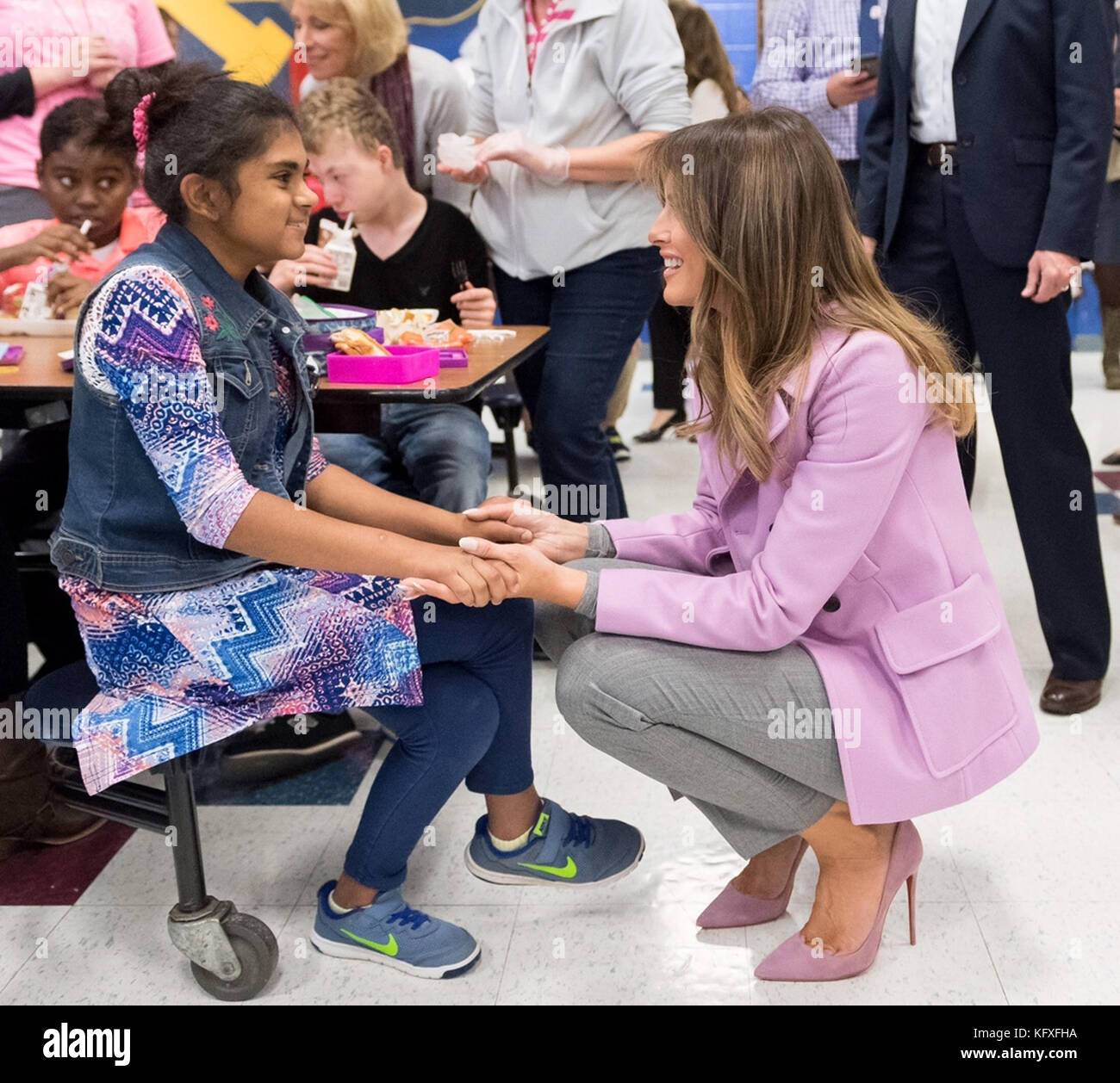 First Lady Melania Trump speaks with a middle school student, during ...