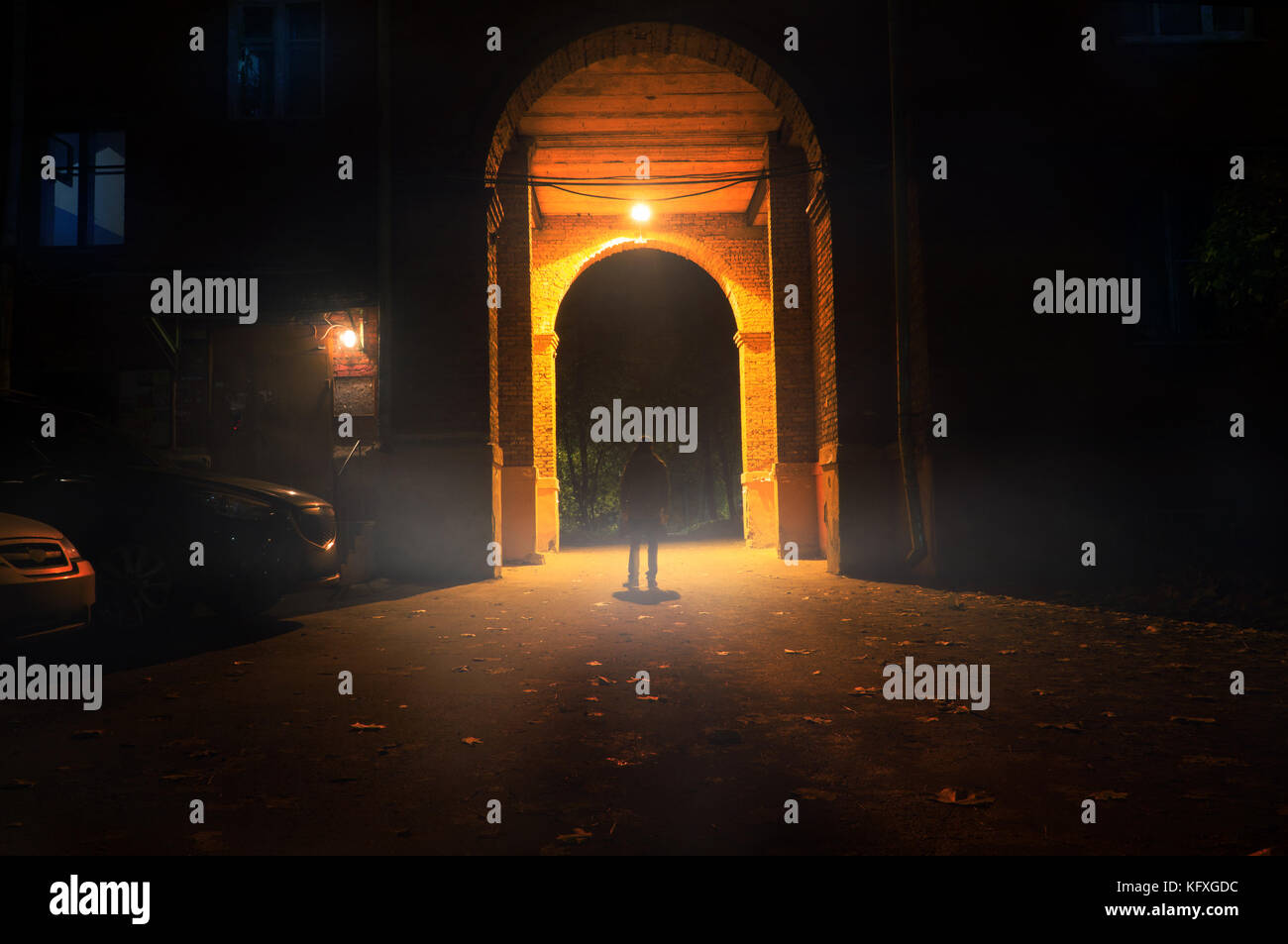An old man standing alone at the beach hi-res stock photography and ...