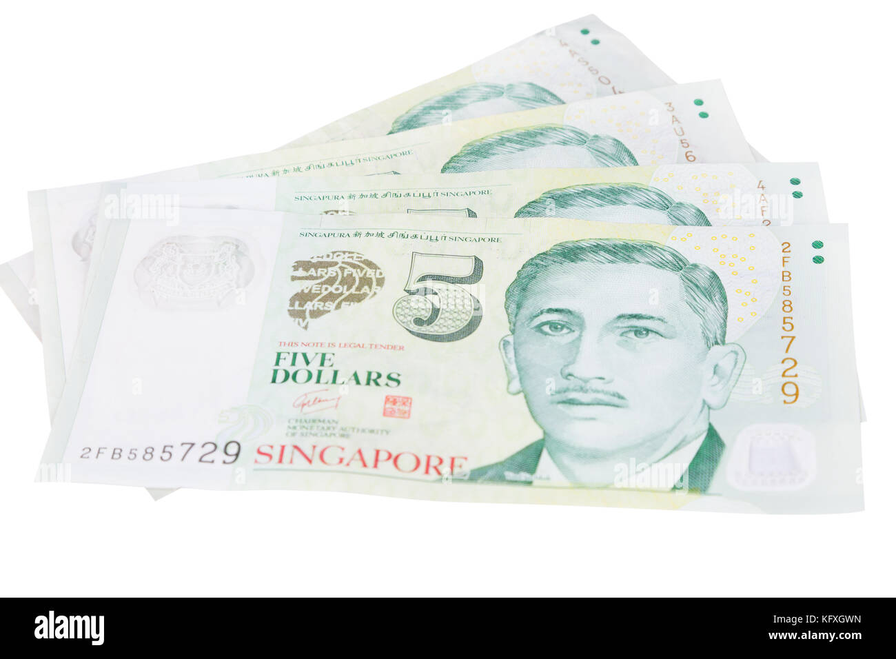 Singapore banknotes dollars (5 SGD) isolated on a white background ...