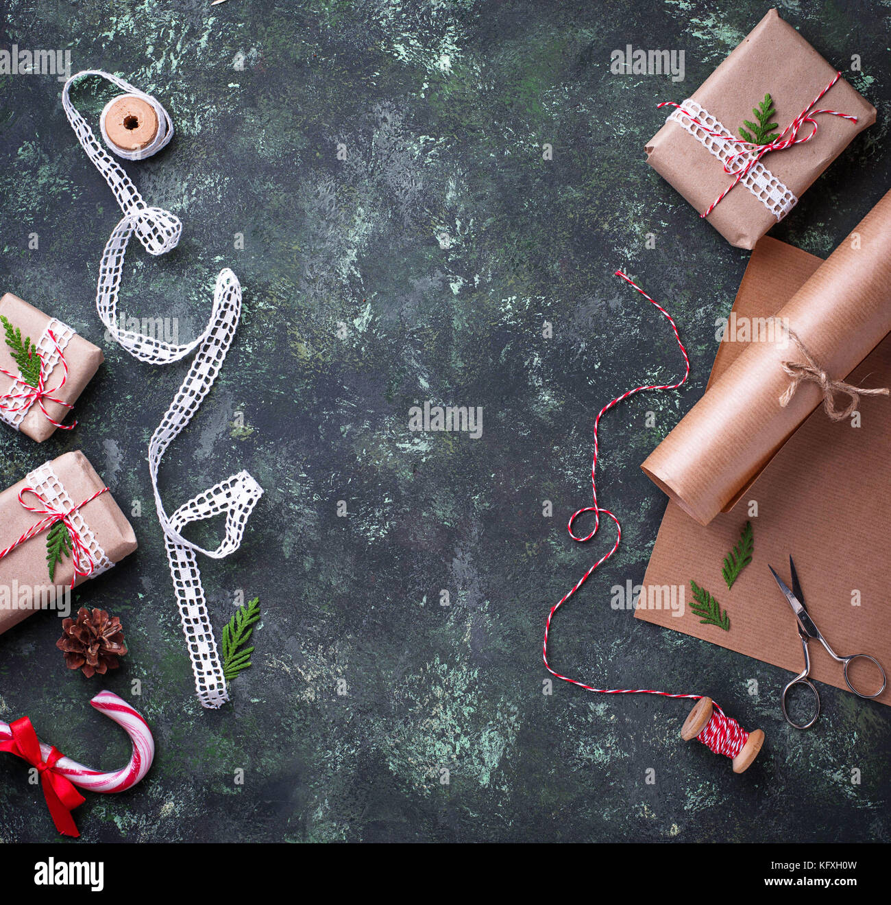 Process of packing boxes with Christmas gifts presents. Top view Stock ...