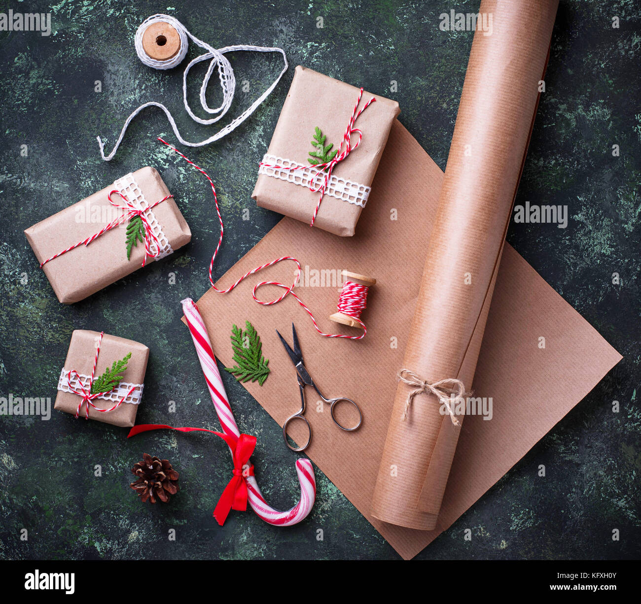 Process of packing boxes with Christmas gifts presents Stock Photo - Alamy