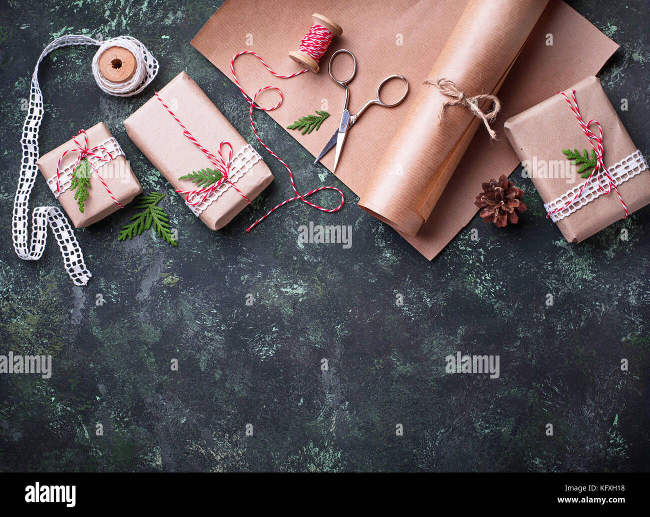 Process of packing boxes with Christmas gifts presents Stock Photo - Alamy