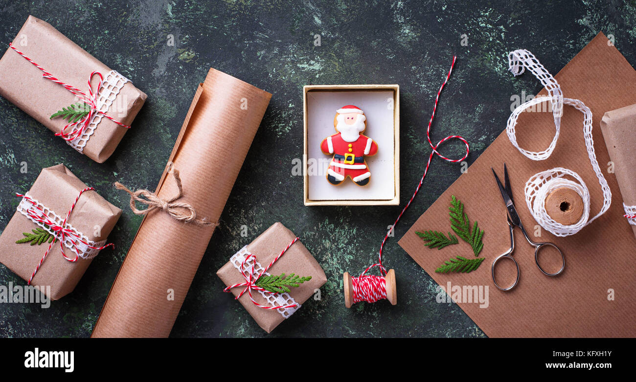Process of packing boxes with Christmas gifts presents Stock Photo - Alamy
