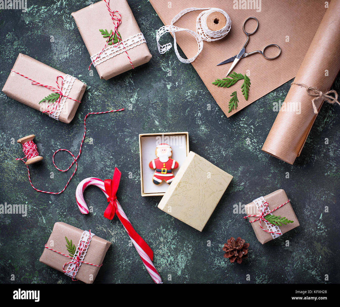 Process of packing boxes with Christmas gifts presents Stock Photo - Alamy