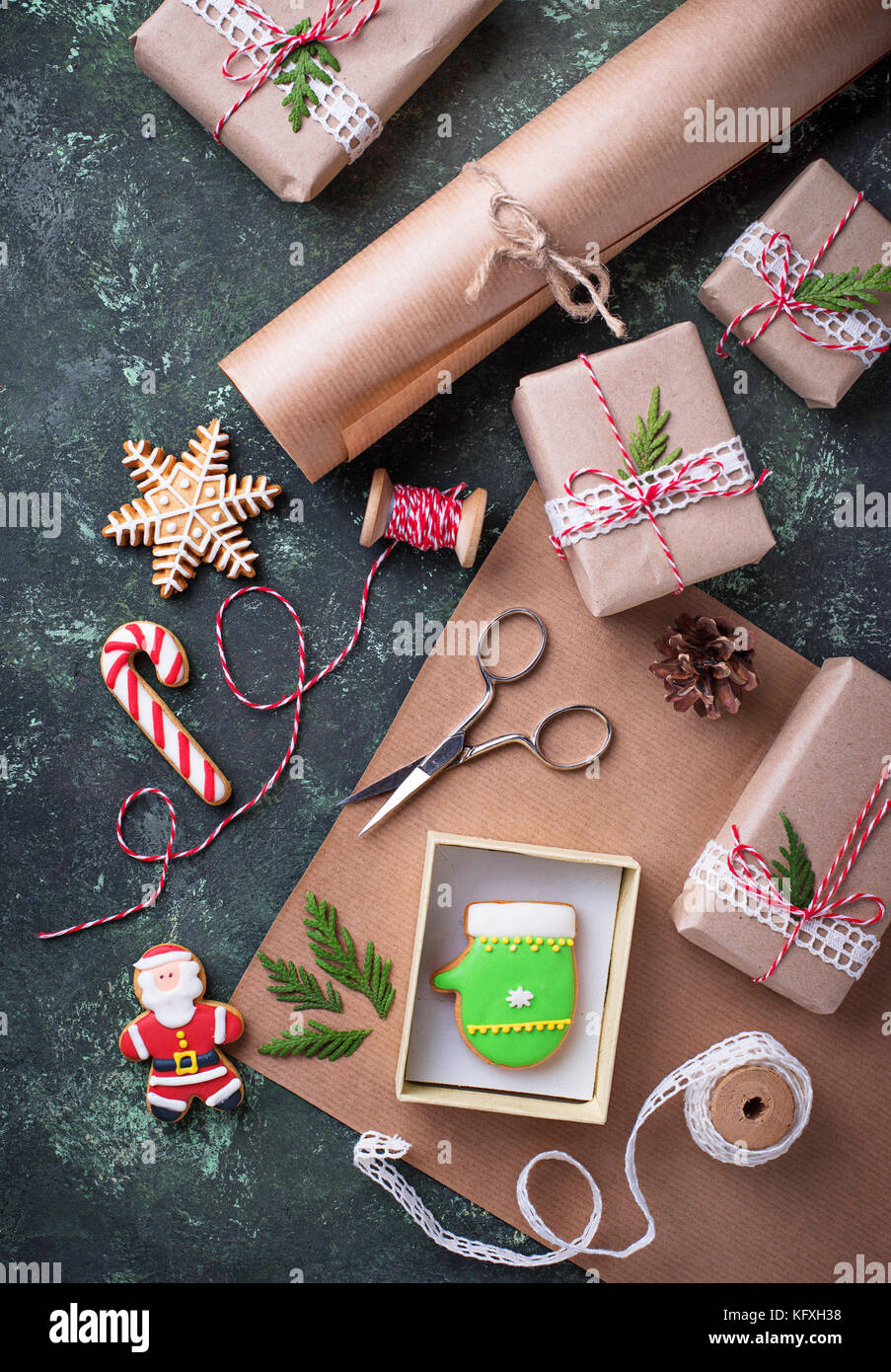Process of packing boxes with Christmas gifts presents Stock Photo - Alamy