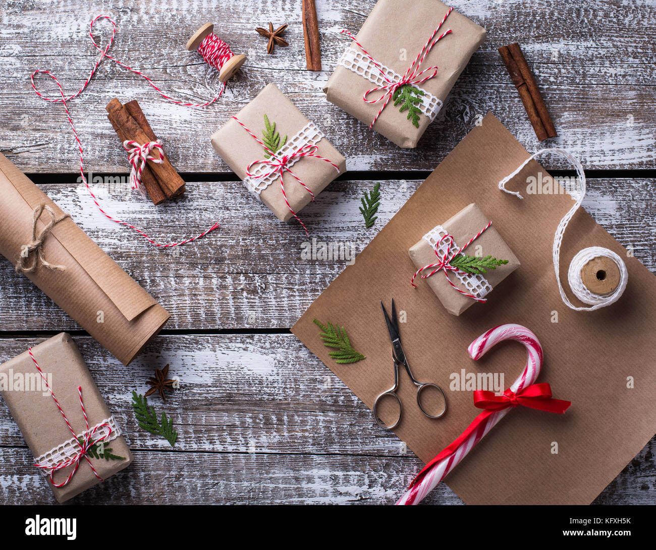 Process of packing boxes with Christmas gifts presents Stock Photo - Alamy