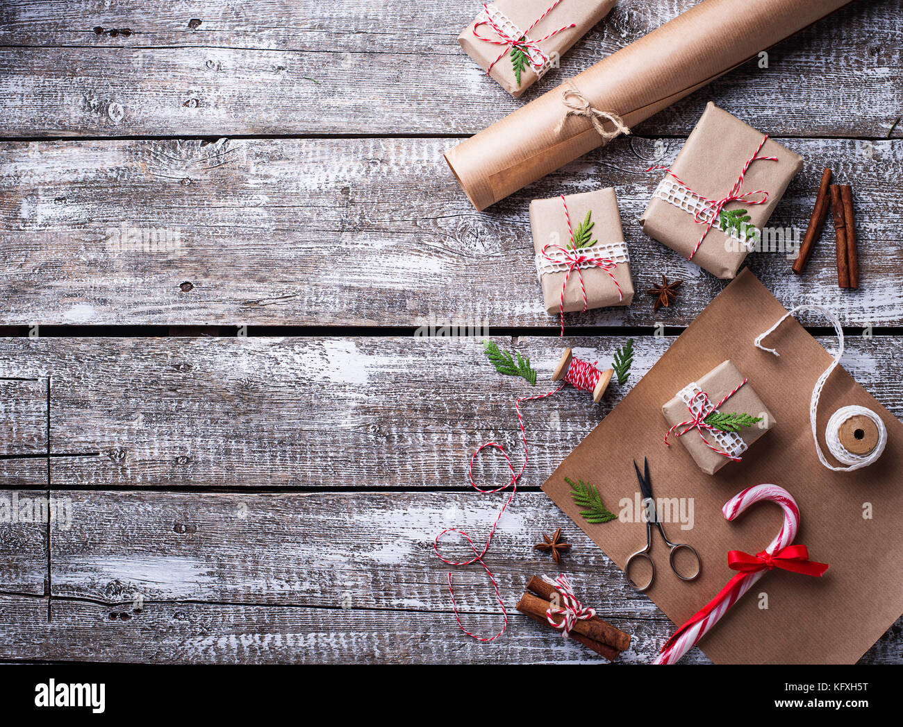 Process of packing boxes with Christmas gifts presents Stock Photo - Alamy