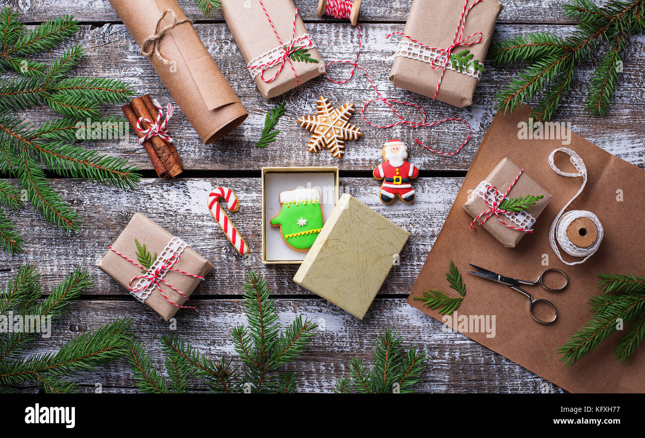 Process of packing boxes with Christmas gifts presents Stock Photo - Alamy