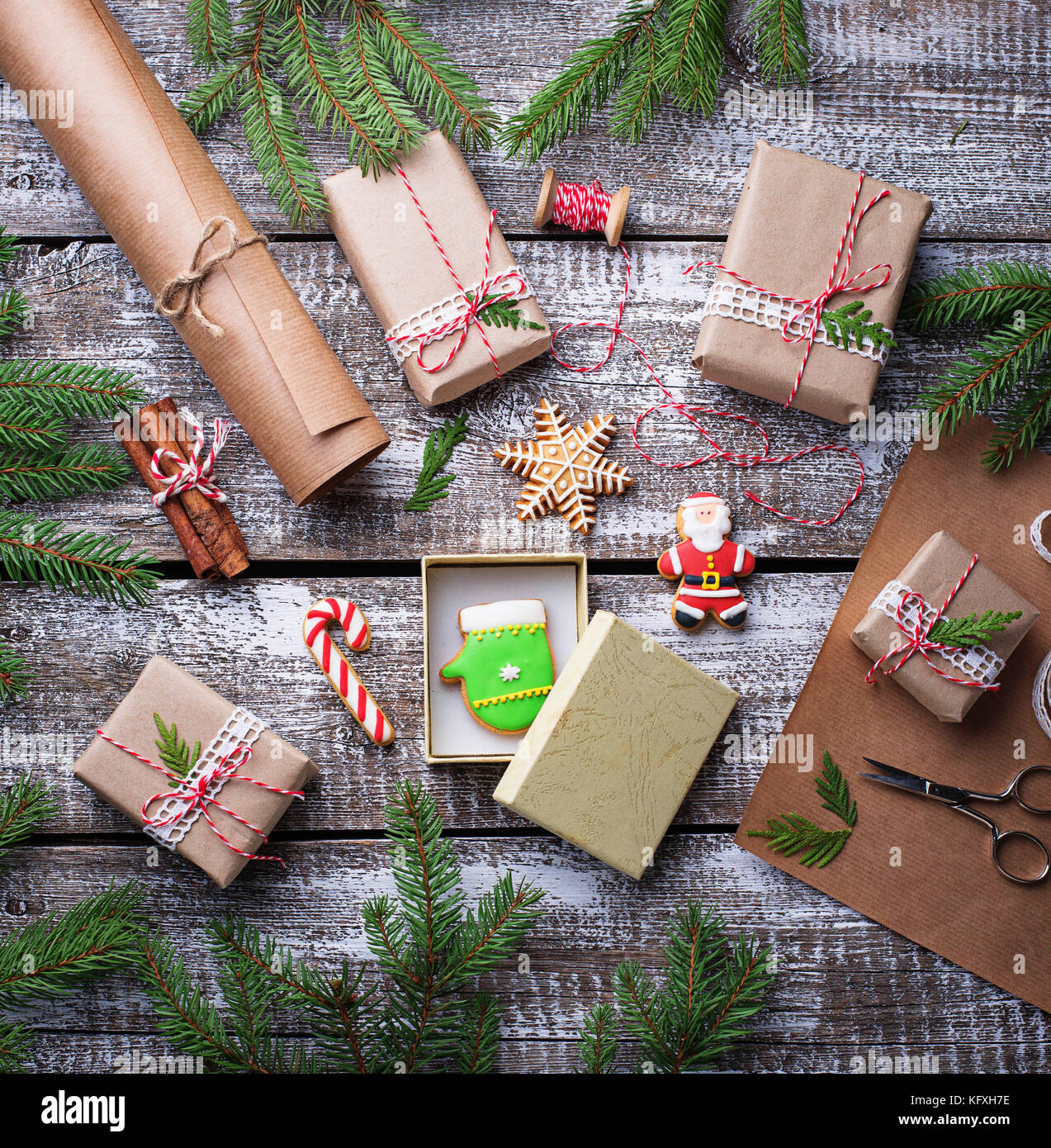Process of packing boxes with Christmas gifts presents Stock Photo - Alamy
