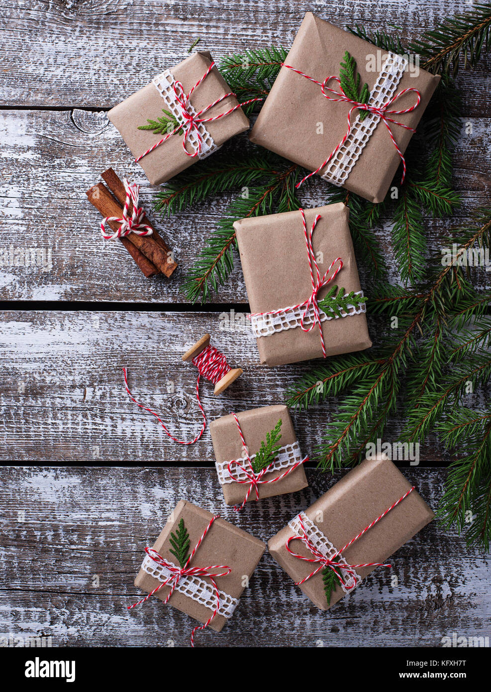Christmas gift boxes in craft paper Stock Photo - Alamy
