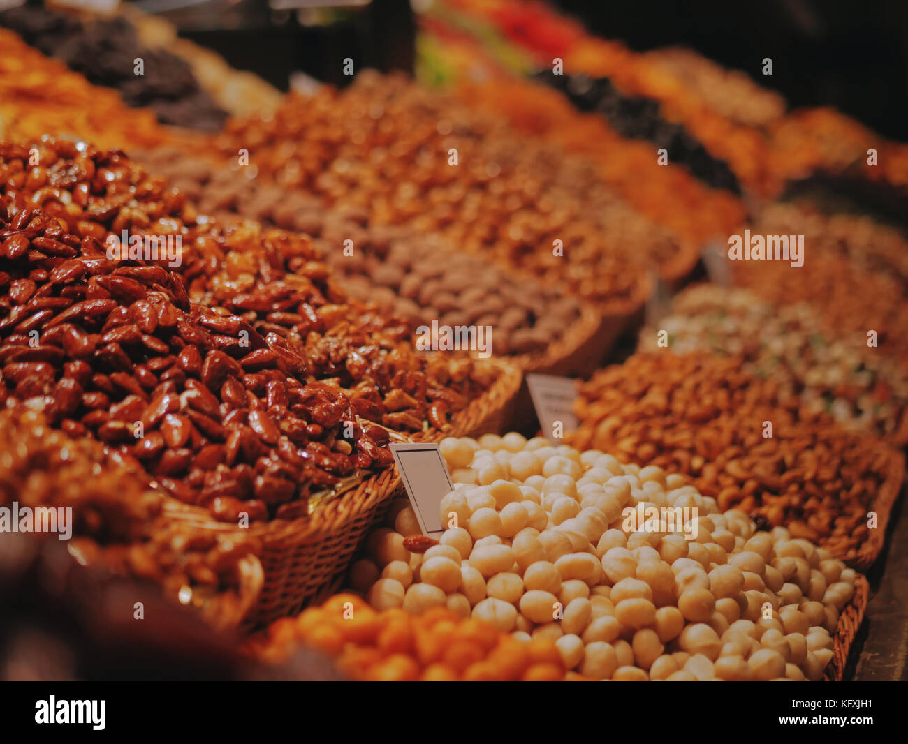 Dry fruits on the market in Barcelona. Sweets, nuts and chocolate Stock ...