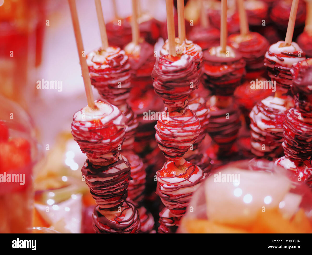 Chocolate dipped strawberries on market display Stock Photo - Alamy