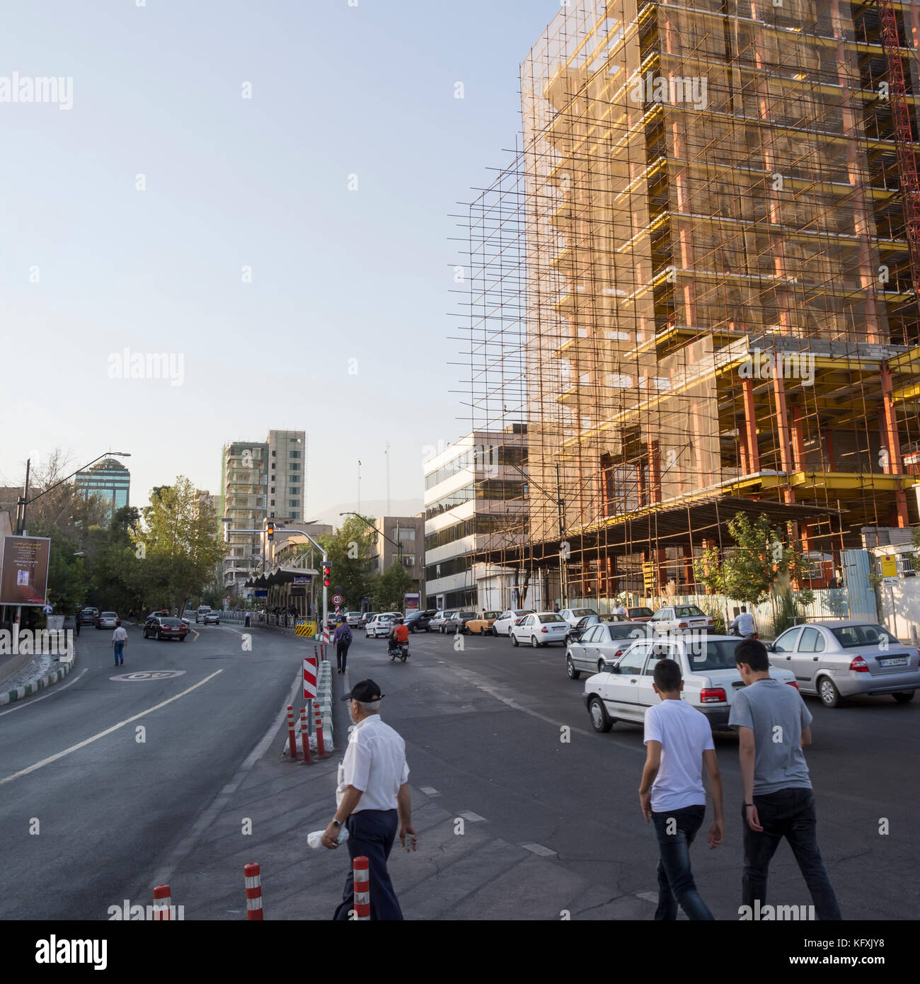 Tehran, IRAN - August 16, 2017 Under construction building beside the ...