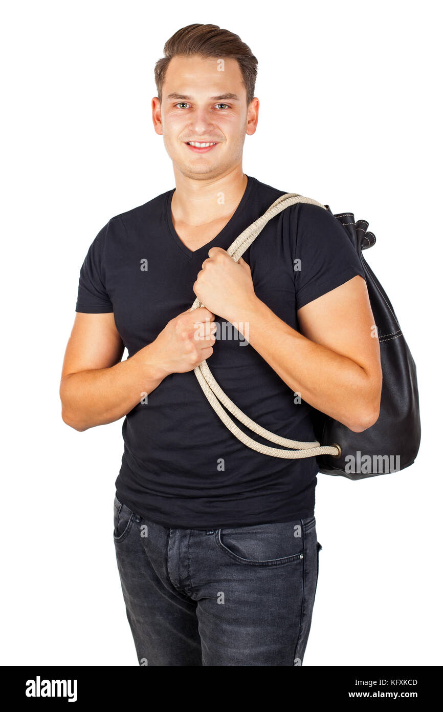 Photo of a happy man holding his brown leather backpack Stock Photo - Alamy