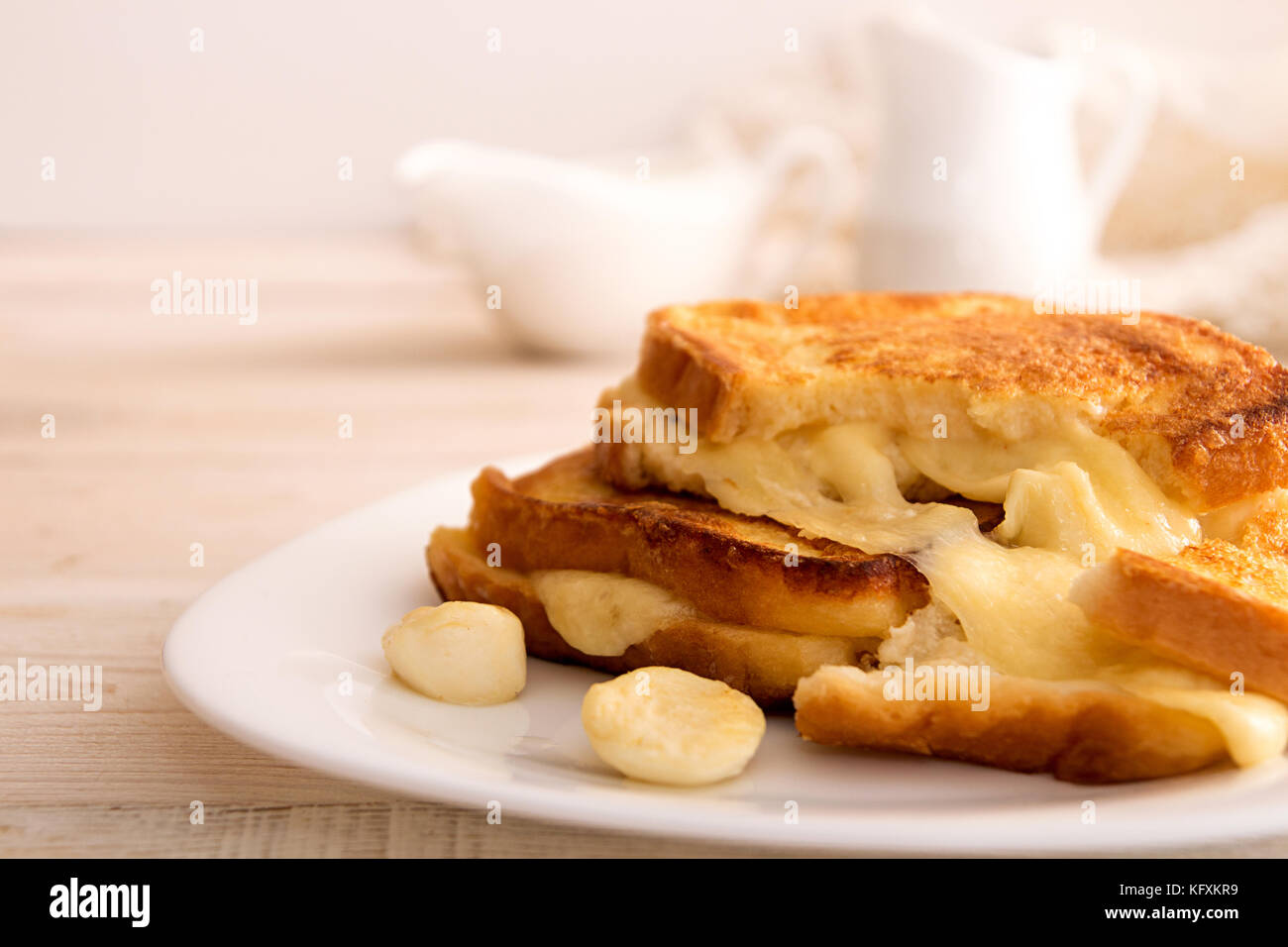 Italian toast sandwich with white bread and mozzarella cheese fried in ...