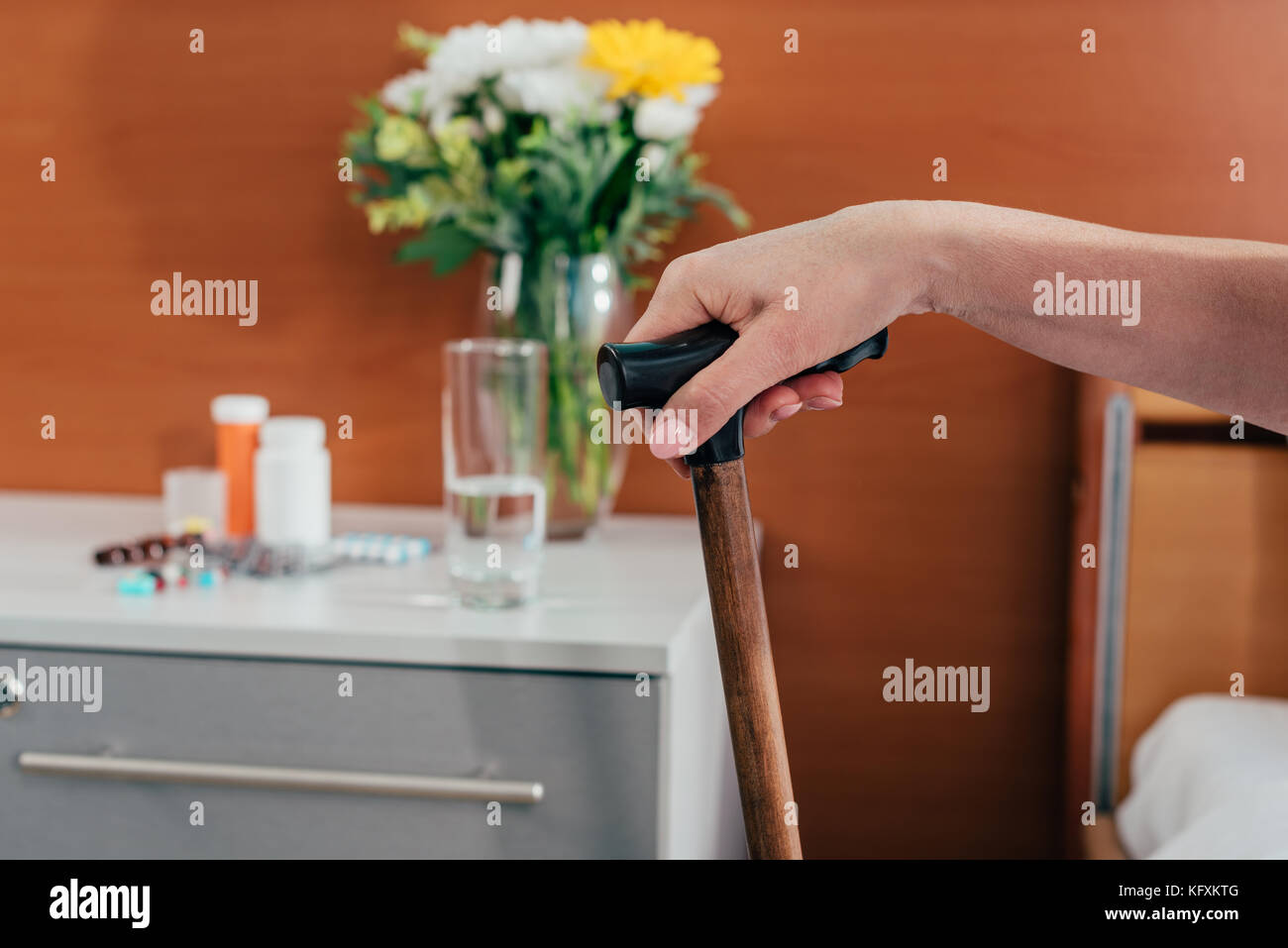 senior woman with cane in hospital Stock Photo - Alamy
