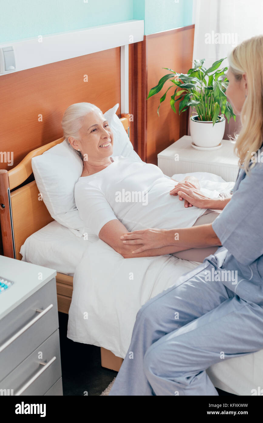 nurse and senior woman Stock Photo - Alamy