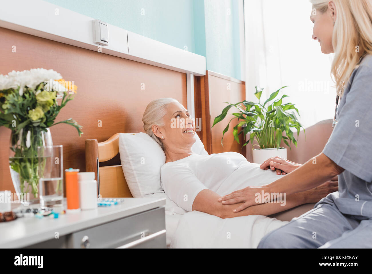 nurse and senior woman Stock Photo - Alamy