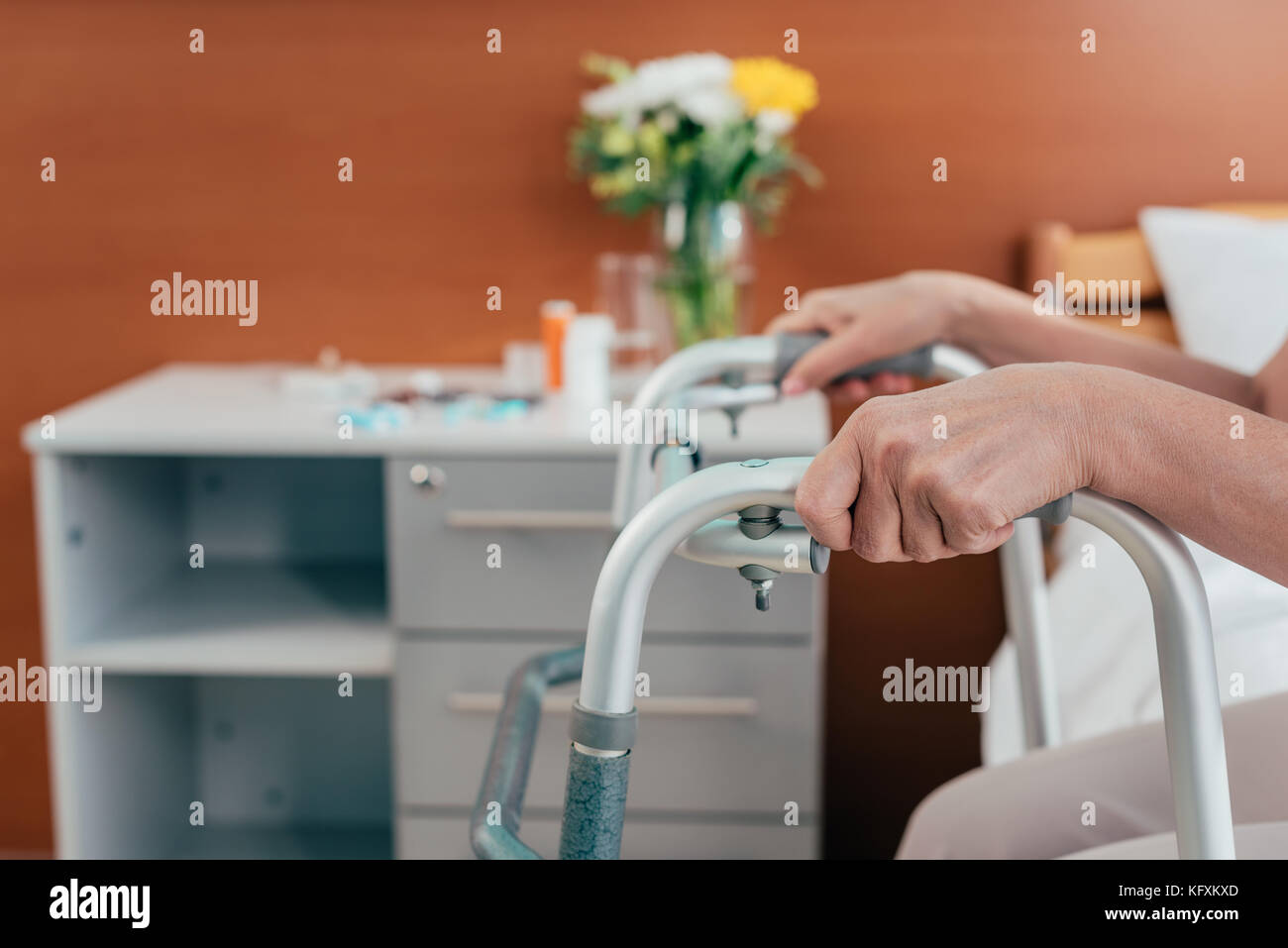 Woman with walker at hospital hi-res stock photography and images - Alamy